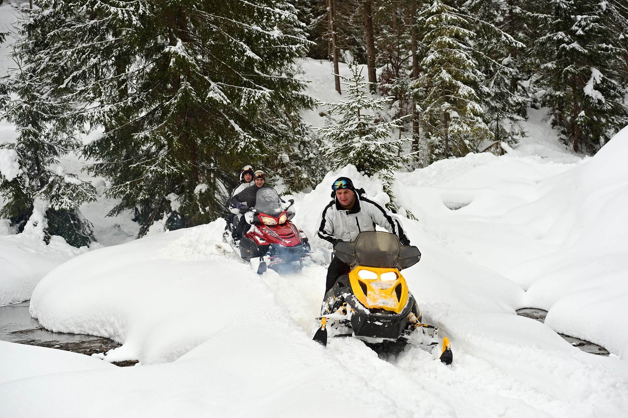 Snowmobiling • Crystal Creek Mountain Lodge